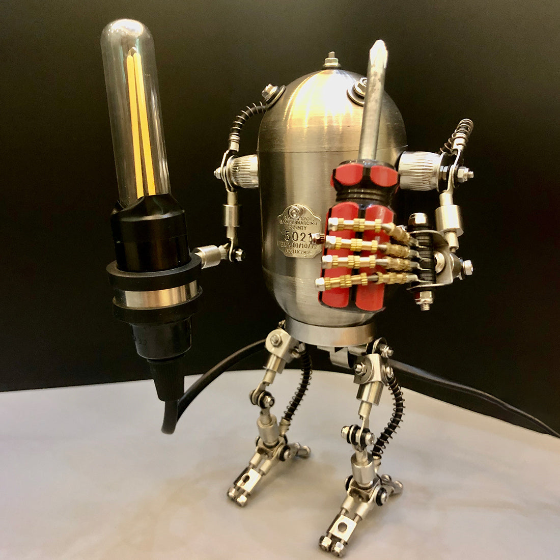 50Pcs+ Steampunk Style Iron Little Robot Man with Light Sword Model Ki